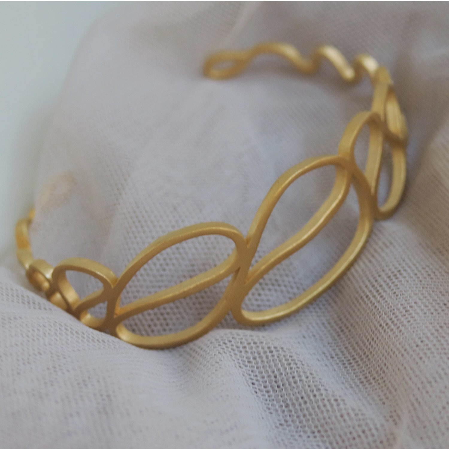 GAUDÍ JEWELRY Rigid and open golden bracelet | Joidart